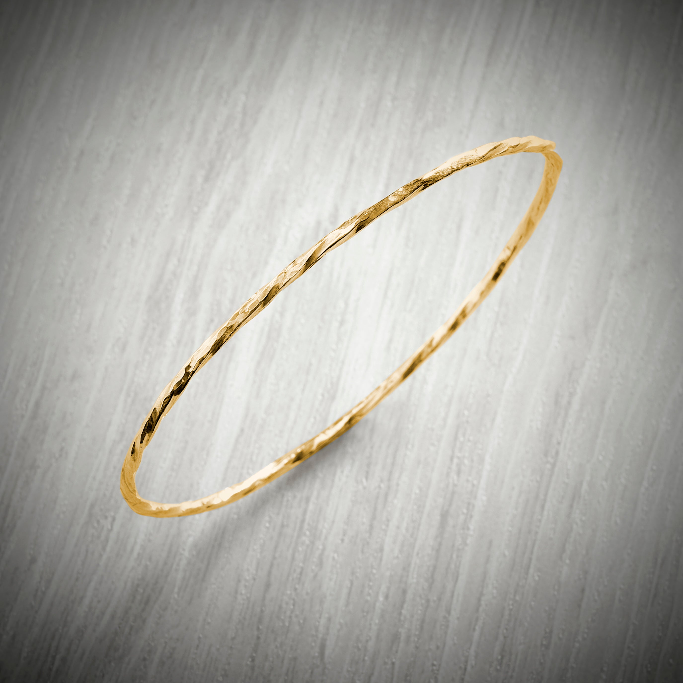 Solid Gold Slimline Twisted Bangle by Emma White – Emma White & The Jewellery Makers